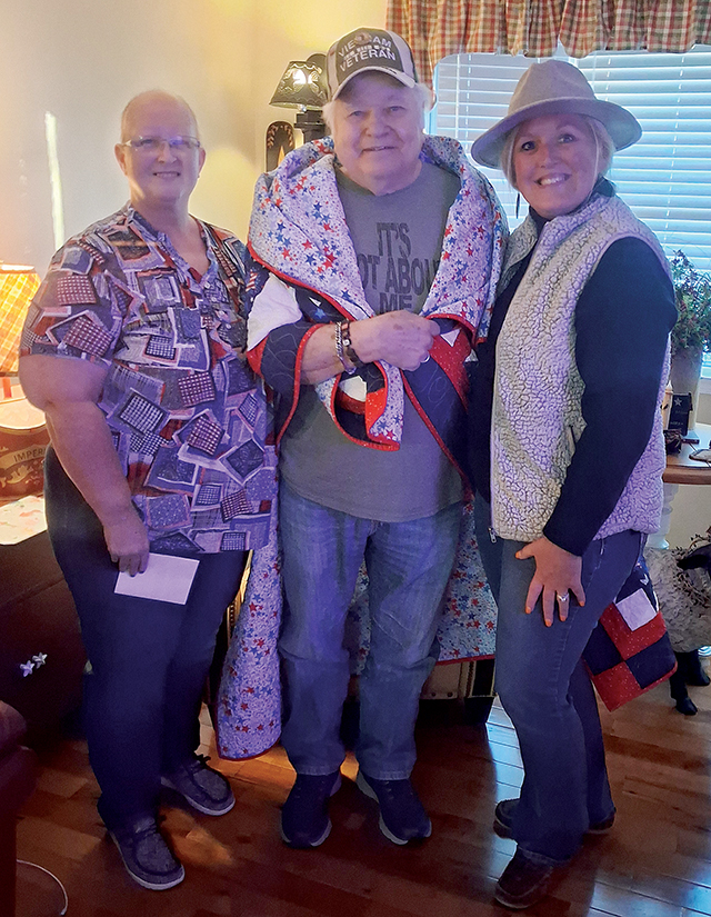 Boyd Pruitt honored with Quilt of Valor during 85th birthday ...